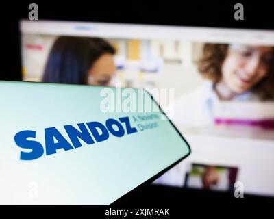 Cellphone with logo of pharmaceutical company Sandoz International GmbH ...