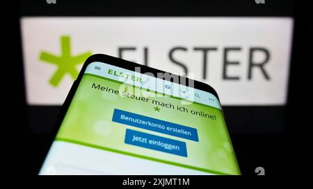 Mobile phone with website of German tax software Elster on screen in ...