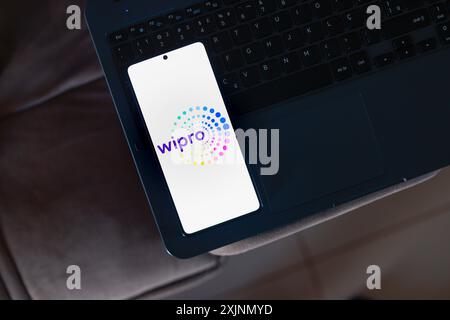 In this photo illustration, the Wipro Technologies logo is displayed on ...