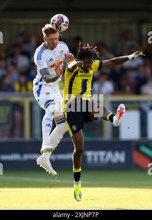 Leeds United's Joe Rodon (left) with AC Milan's Pervis Estupinan during ...