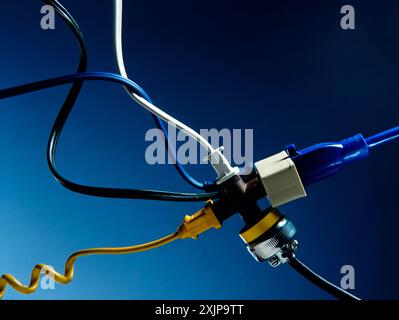 Overloaded extension cord Stock Photo - Alamy