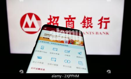 Smartphone with webpage of China Merchants Bank Company Limited (CMB ...