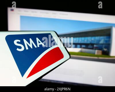 Smartphone with logo of German company SMA Solar Technology AG on ...