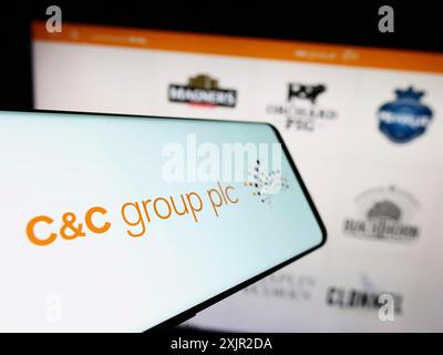 Smartphone with logo of Irish alcoholic beverages company C and C Group ...