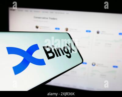 Mobile phone with website of cryptocurrency exchange company Bitstamp ...