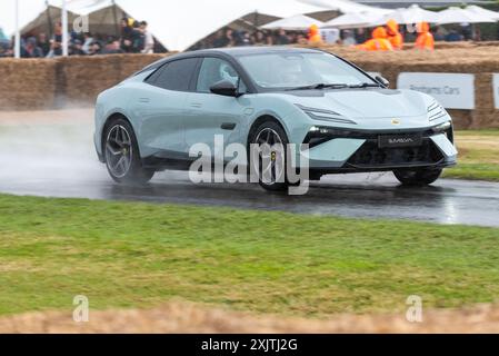 2024 Lotus Emeya S electric car driving up the hill climb track at the ...