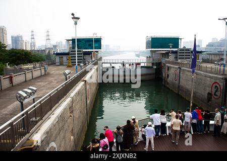 Three Gorges Dam spillways and navigation lock vessel traffic boat door ...