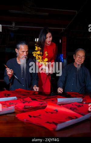 Vietnamese scholar writes calligraphy at lunar new year calligraphy ...