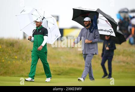 South Africa's Dean Burmester and USA's Scottie Scheffler on the 3rd ...