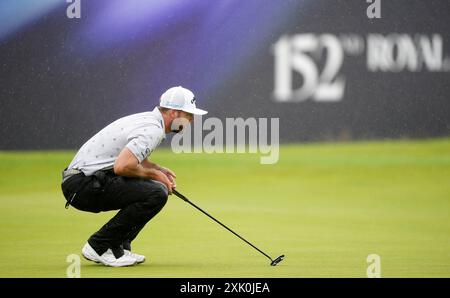 Sam Burns lines up a putt on the sixth hole during the third round of ...