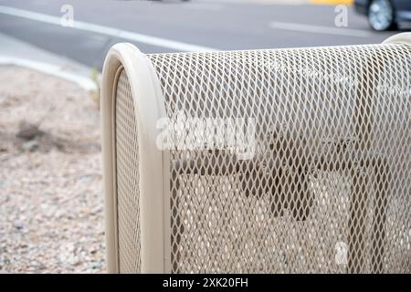 Protective cage cover placed over a utility meter to prevent tampering ...