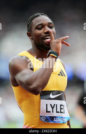 winner Noah Lyles of United States of America celebrating and holding ...