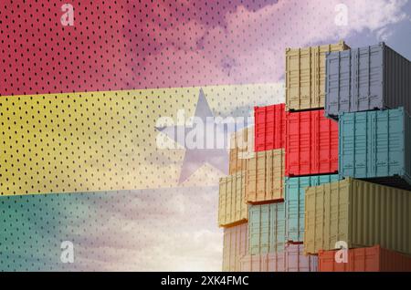 Ghana flag and big stack of shipping cargo containers in docks with sky ...