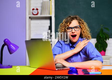 Surprised student preparing exam and learning lessons in school ...