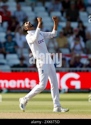 England's Shoaib Bashir (second right) celebrates the wicket of ...