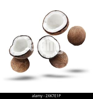 Many coconuts in air on white background Stock Photo - Alamy
