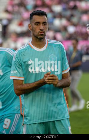 Inter Miami midfielder Sergio Busquets gets a hug from forward Lionel ...