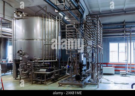Modern brewery production line, vats and pipeline Stock Photo - Alamy