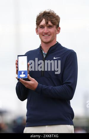 Scotland's Calum Scott with the Silver Medal for top amateur following ...