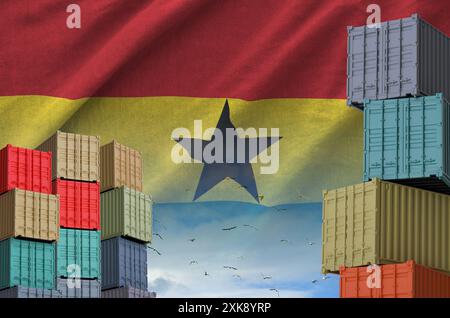 Ghana flag and big stack of shipping cargo containers in docks with sky ...