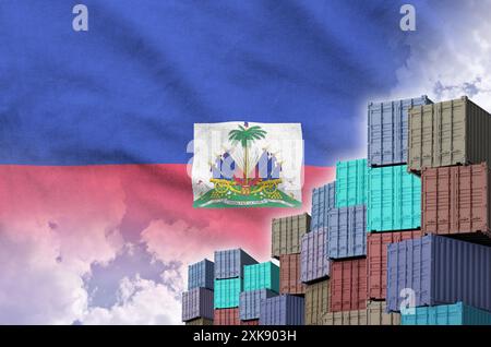 Haiti flag and big stack of shipping cargo containers in docks with sky ...