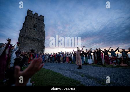 People surround Magdalene Rose Priestess, Chloe Mercer on the ...