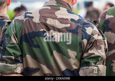 French soldier working in camouflage uniform, french army Stock Photo ...