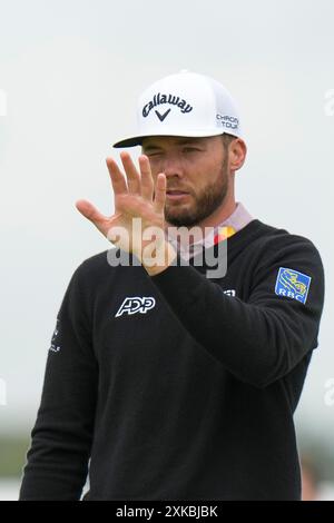 Sam Burns lines up a putt on the sixth hole during the third round of ...