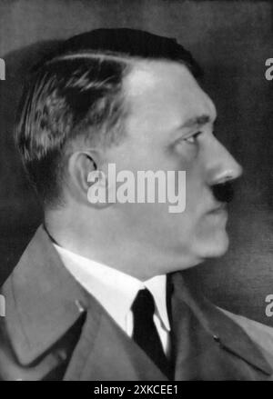 A historical photograph of Adolf Hitler speaking at a rally ...
