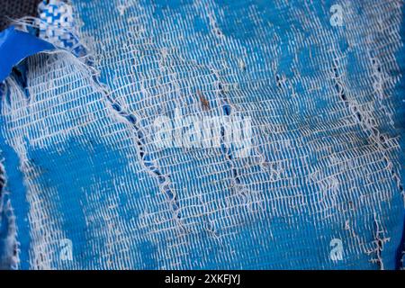 Worn out, obsolete Poly-Tarpaulin blue tarp texture close up Stock ...