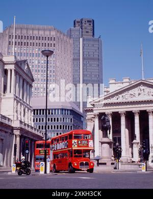 Double-decker buses on Threadneedle Street showing the Bank of England ...