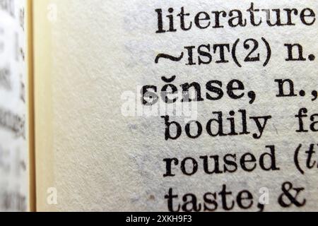 Word sense on dictionary page, macro close-up Stock Photo - Alamy
