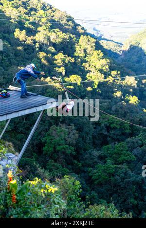 A woman falls into Graskop Gorge with a rope swing. Graskop Gorge along ...