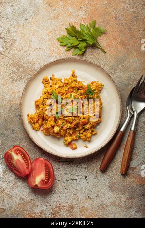 Plate of akuri indian style scrambled eggs with spices and herbs top ...