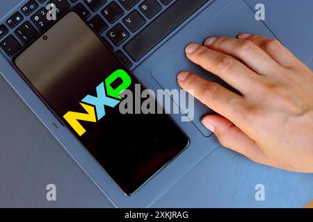 In this photo illustration, the NXP logo is seen displayed on the ...