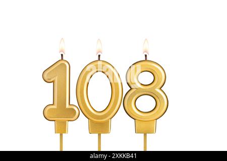 Birthday number 108 - Golden candle on white background Stock Photo - Alamy