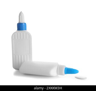 Bottle with spilled glue on white background Stock Photo - Alamy