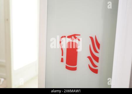 The store aisle is marked with a sign indicating the presence of a fire ...