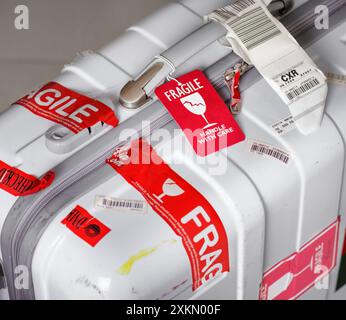 Handle with care baggage sign Stock Photo - Alamy