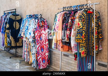 traditional arab silk dresses with a bright colorful pattern in ...