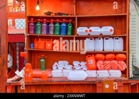 Different types of plastic cans are available to carry Ganga water in ...
