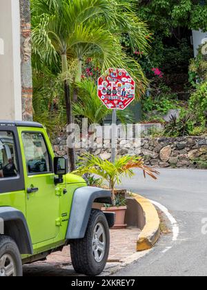 Stop sign covered with stickers in Cruz Bay on the Caribbean island of ...