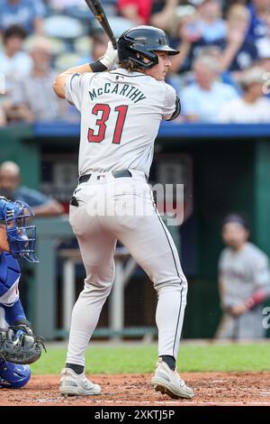 Arizona Diamondbacks' Jake McCarthy (31) scores on a single by Geraldo ...