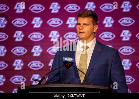 Boston College offensive lineman Drew Kendall runs the 40-yard dash at ...