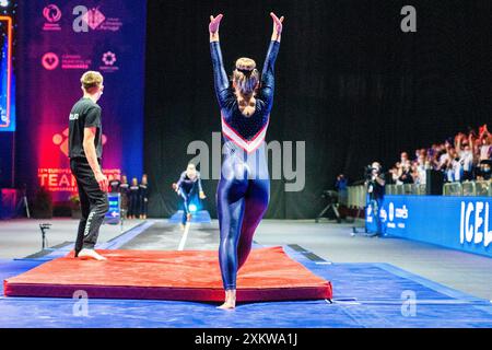 indoor somersault by a female gymnast whose athlete was upside down in ...