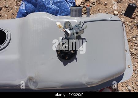 A replacement gas tank being worked up for installation Stock Photo - Alamy