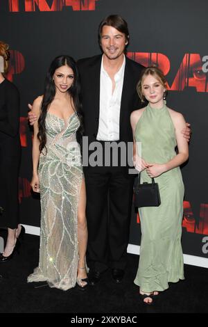 JOSH HARTNETT and ARIEL DONOGHUE in TRAP (2024), directed by M. NIGHT ...