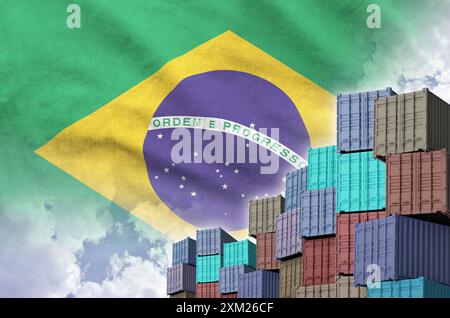 Brazil flag and big stack of shipping cargo containers in docks with ...