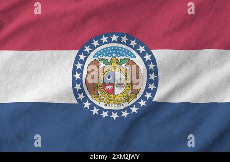 Missouri US state flag depicted on folded wavy fabric of old cloth ...