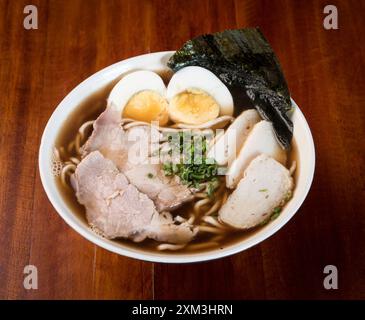 special wantan soup, with pork meat and vegetables. peruvian food ...